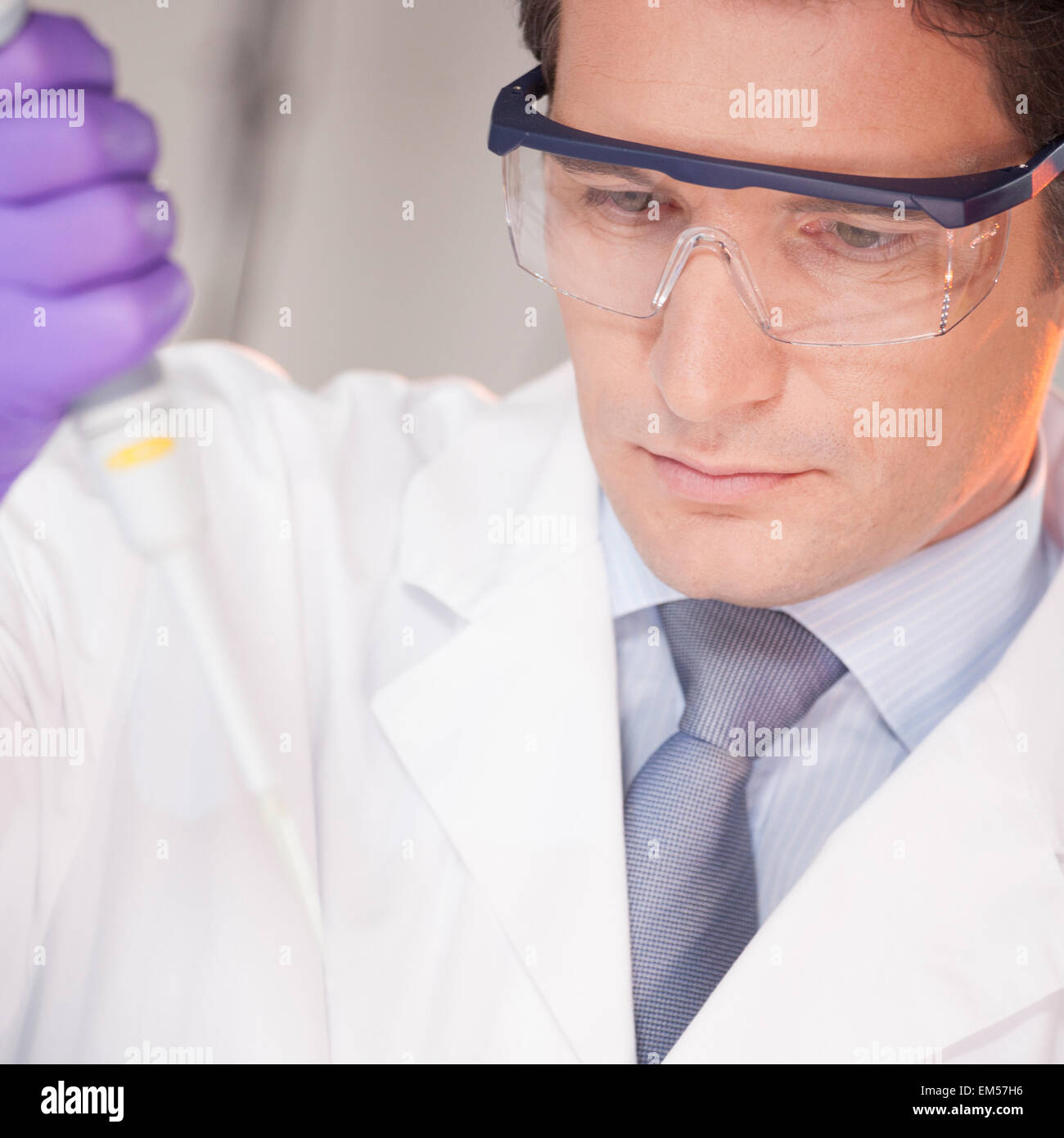 Life scientist pipetting Stock Photo - Alamy