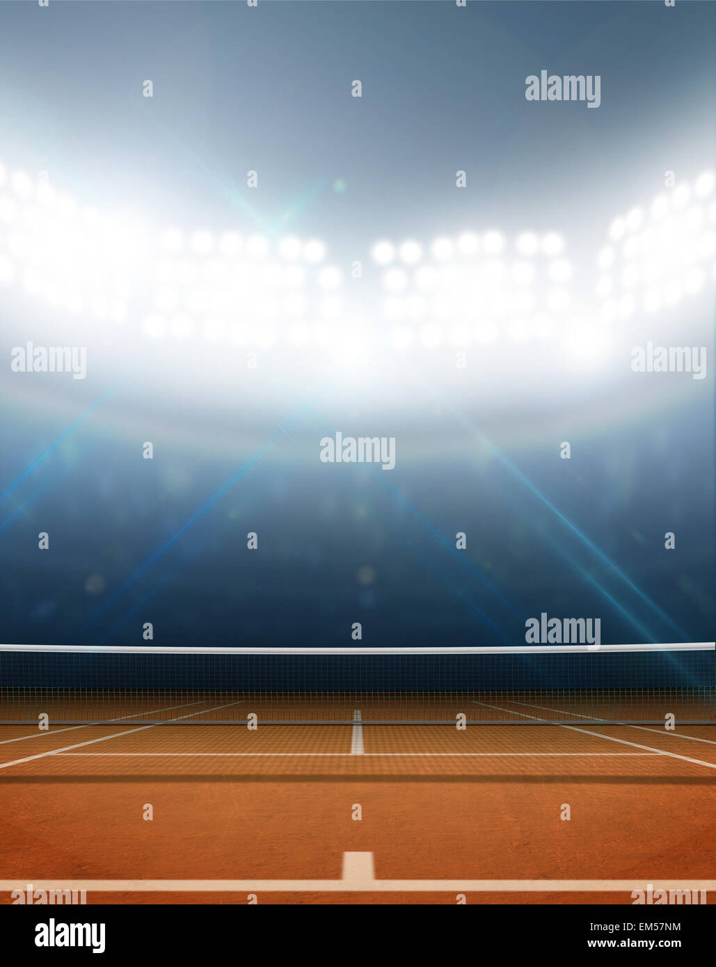 A tennis court in an arena with a marked orange clay surface at night ...