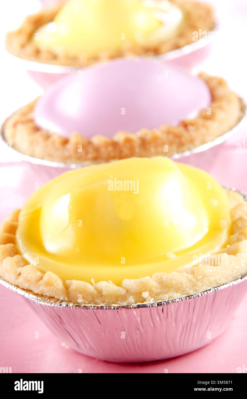 pink and yellow tarts Stock Photo - Alamy