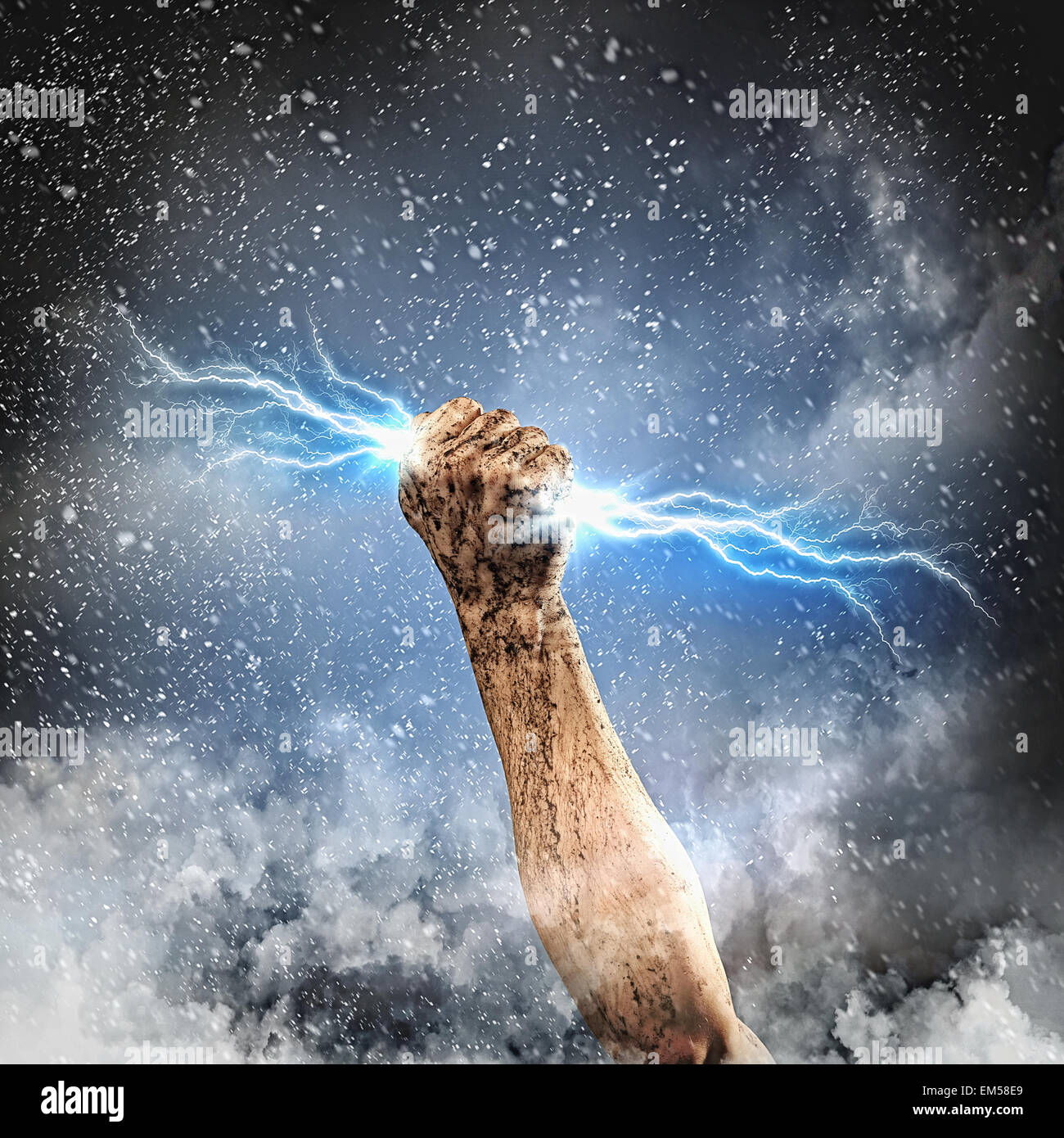 Human hand holding lightning Stock Photo - Alamy