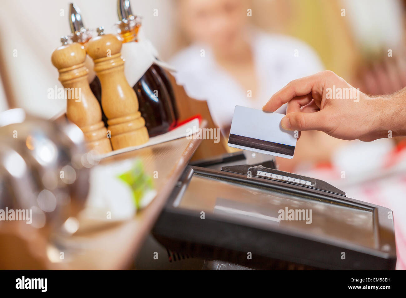 Close-up of cashier hands Stock Photo - Alamy