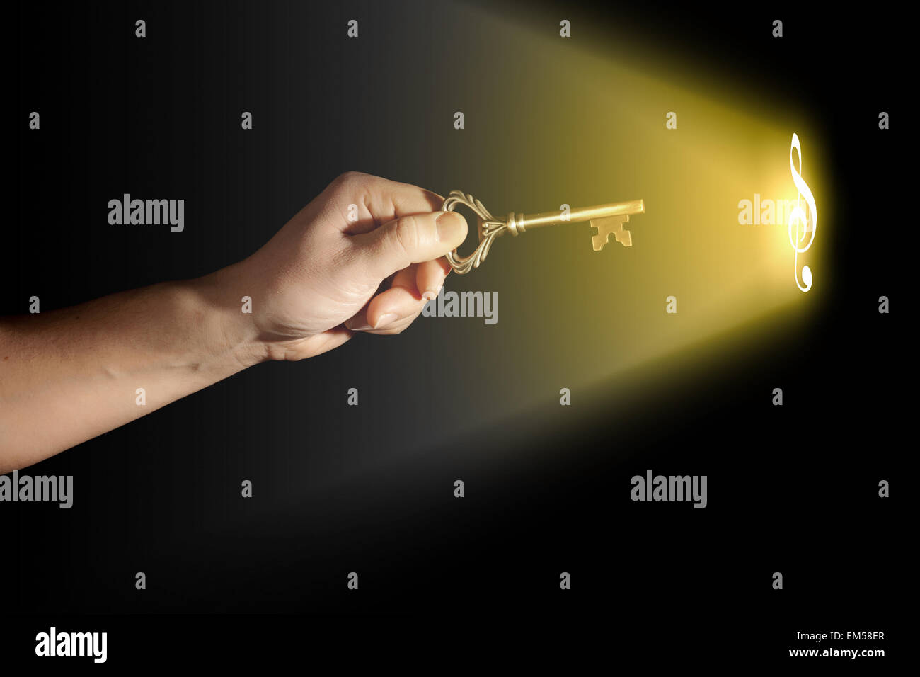 Hand with key Stock Photo - Alamy