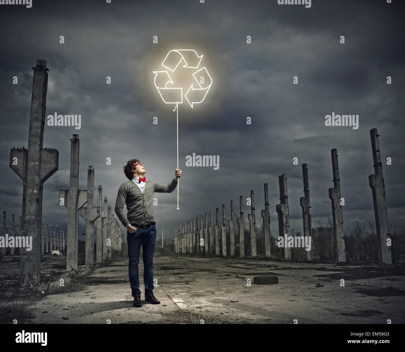 Young man with a recycle symbol Stock Photo - Alamy