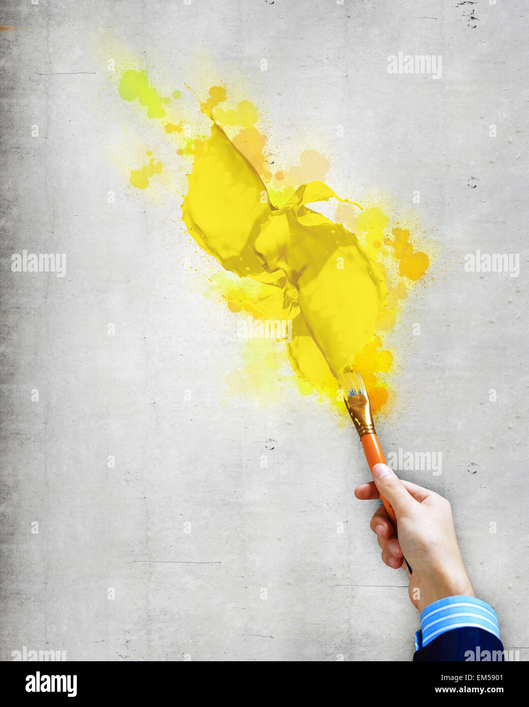 Human hand holding paint brush Stock Photo - Alamy