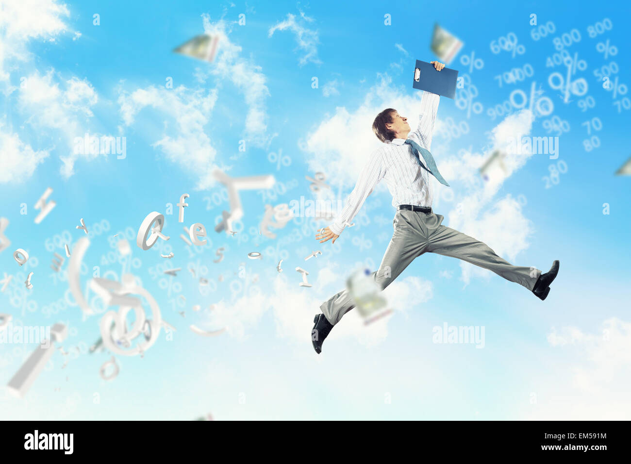 Businessman jumping in blue hi-res stock photography and images - Alamy