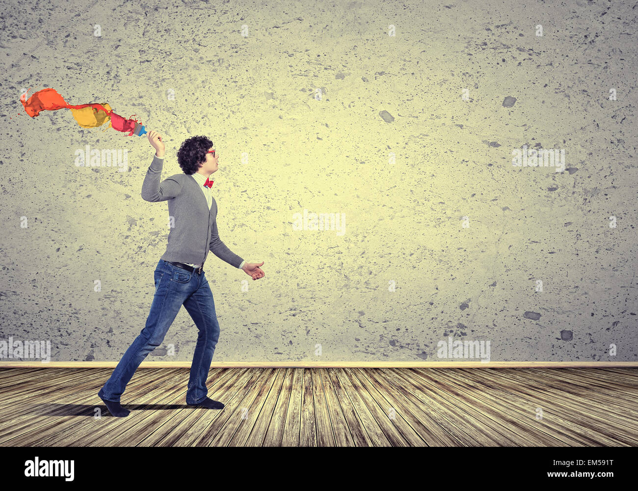 Young man and colour splash Stock Photo - Alamy