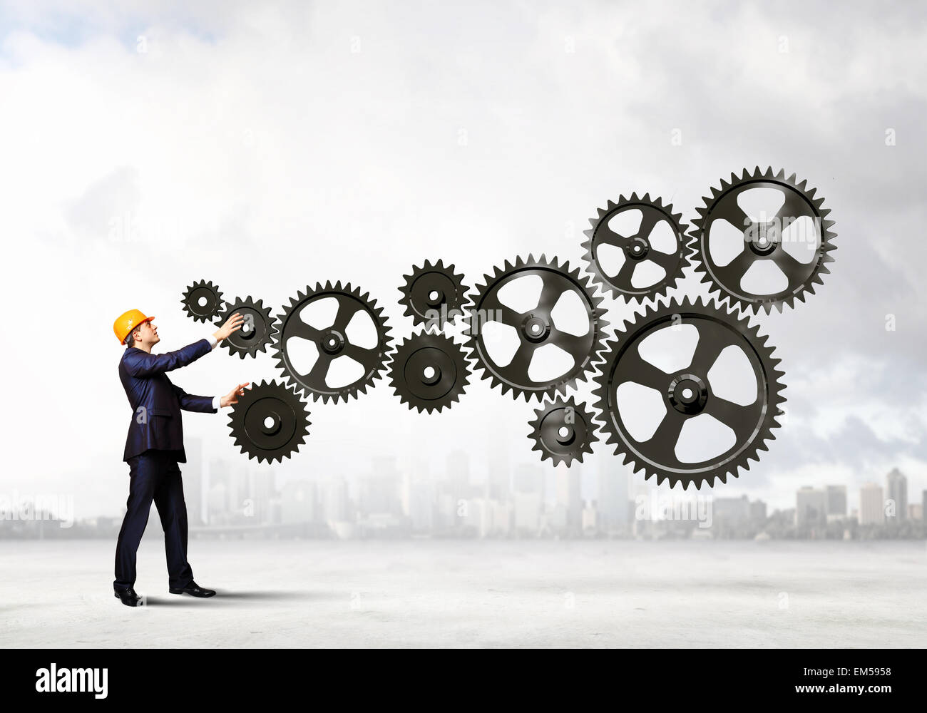 Businessman cog wheel elements construction hi-res stock photography ...