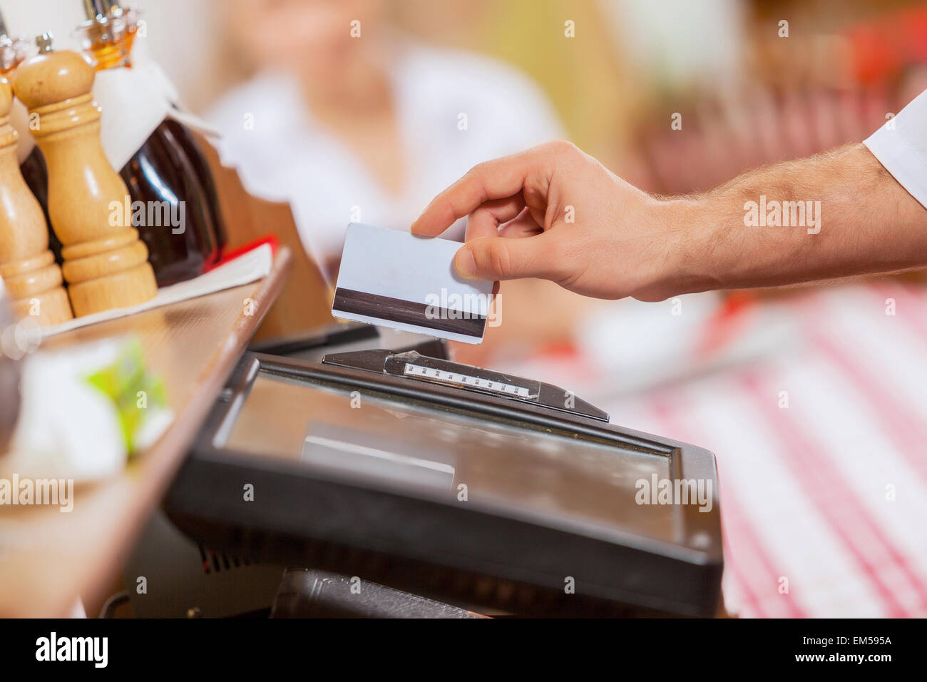 Close-up of cashier hands Stock Photo - Alamy