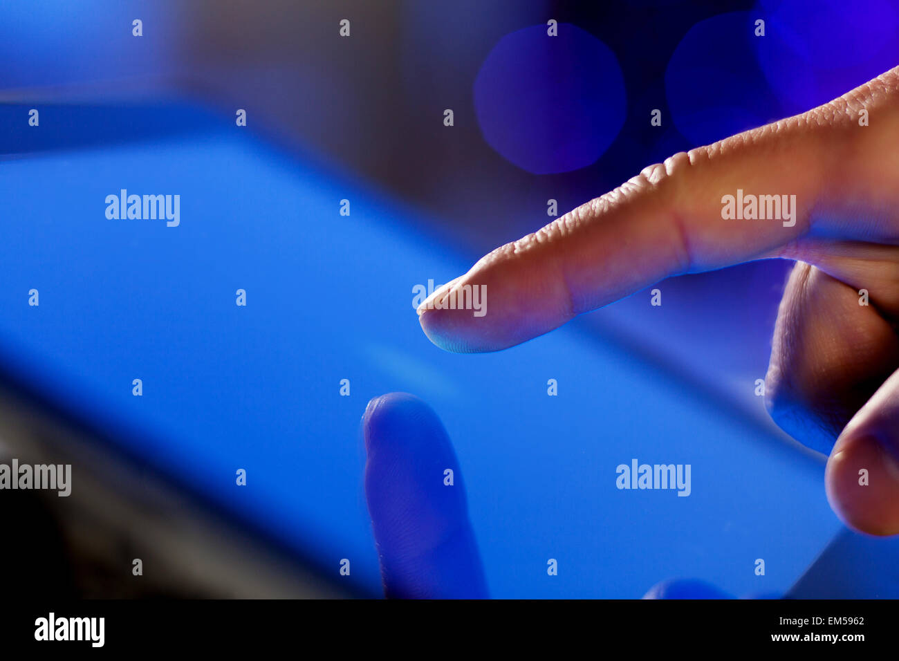 Finger touching screen Stock Photo - Alamy