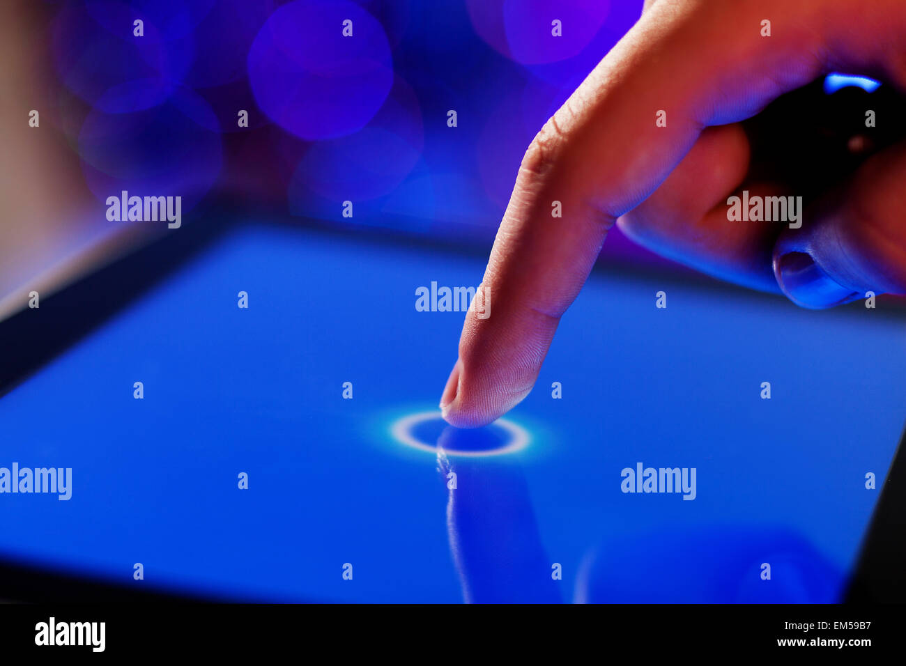 Finger touching screen Stock Photo - Alamy