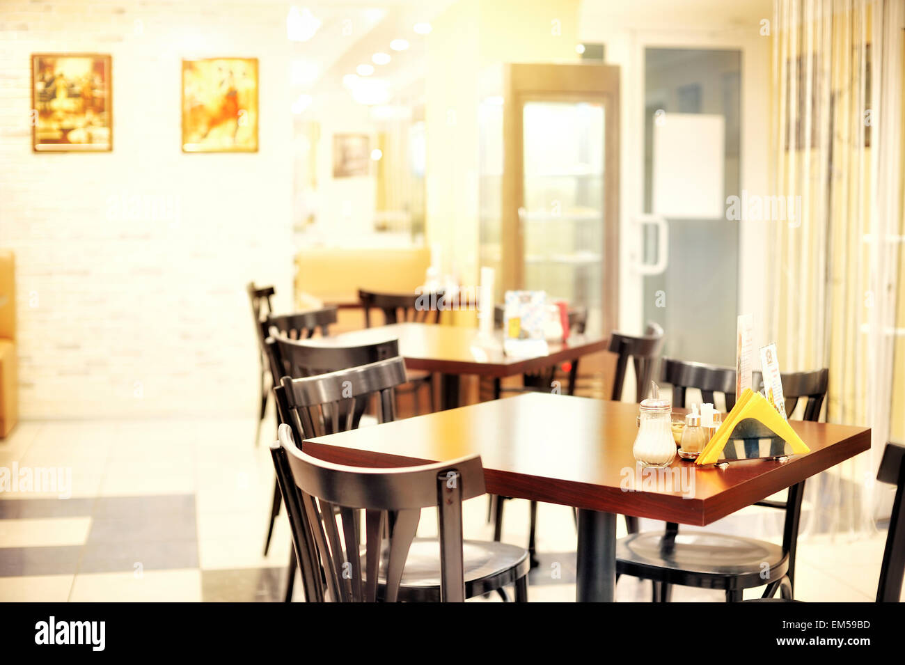 Empty tables in a small cafeteria Stock Photo - Alamy