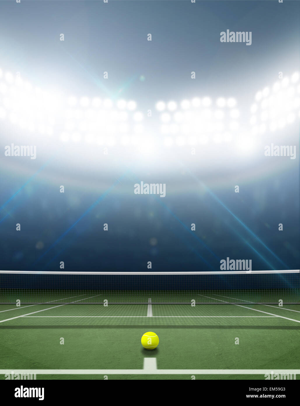 A tennis court in an arena with a marked green hard surface at night ...