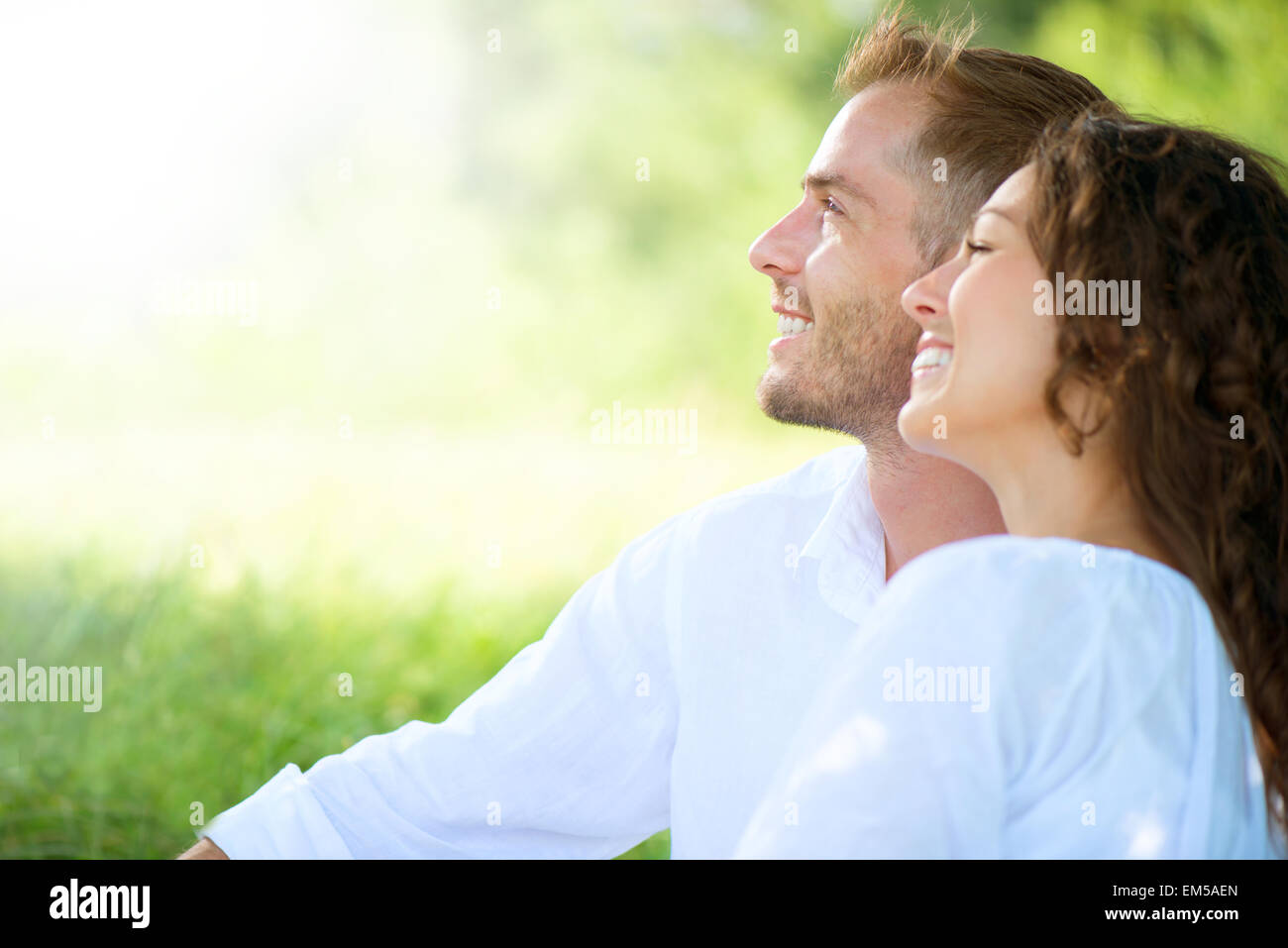 Happy Smiling Couple Relaxing in a Park. Picnic Stock Photo - Alamy
