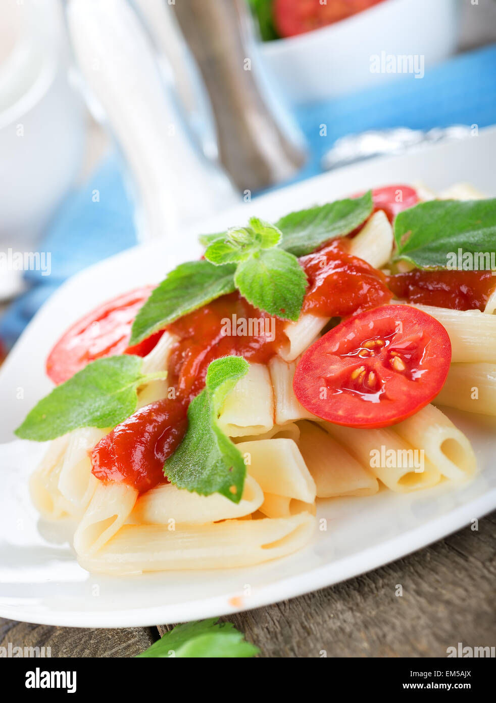 Tomatoes and ketchup on pasta Stock Photo - Alamy