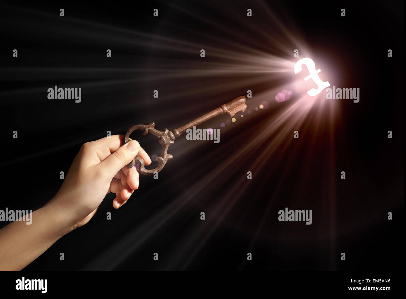 Hand with key Stock Photo - Alamy