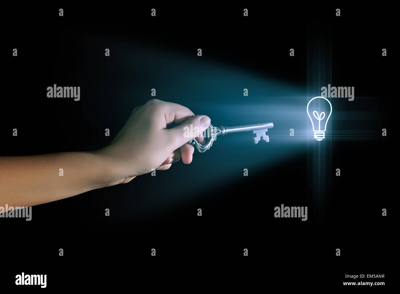 Hand with key Stock Photo - Alamy