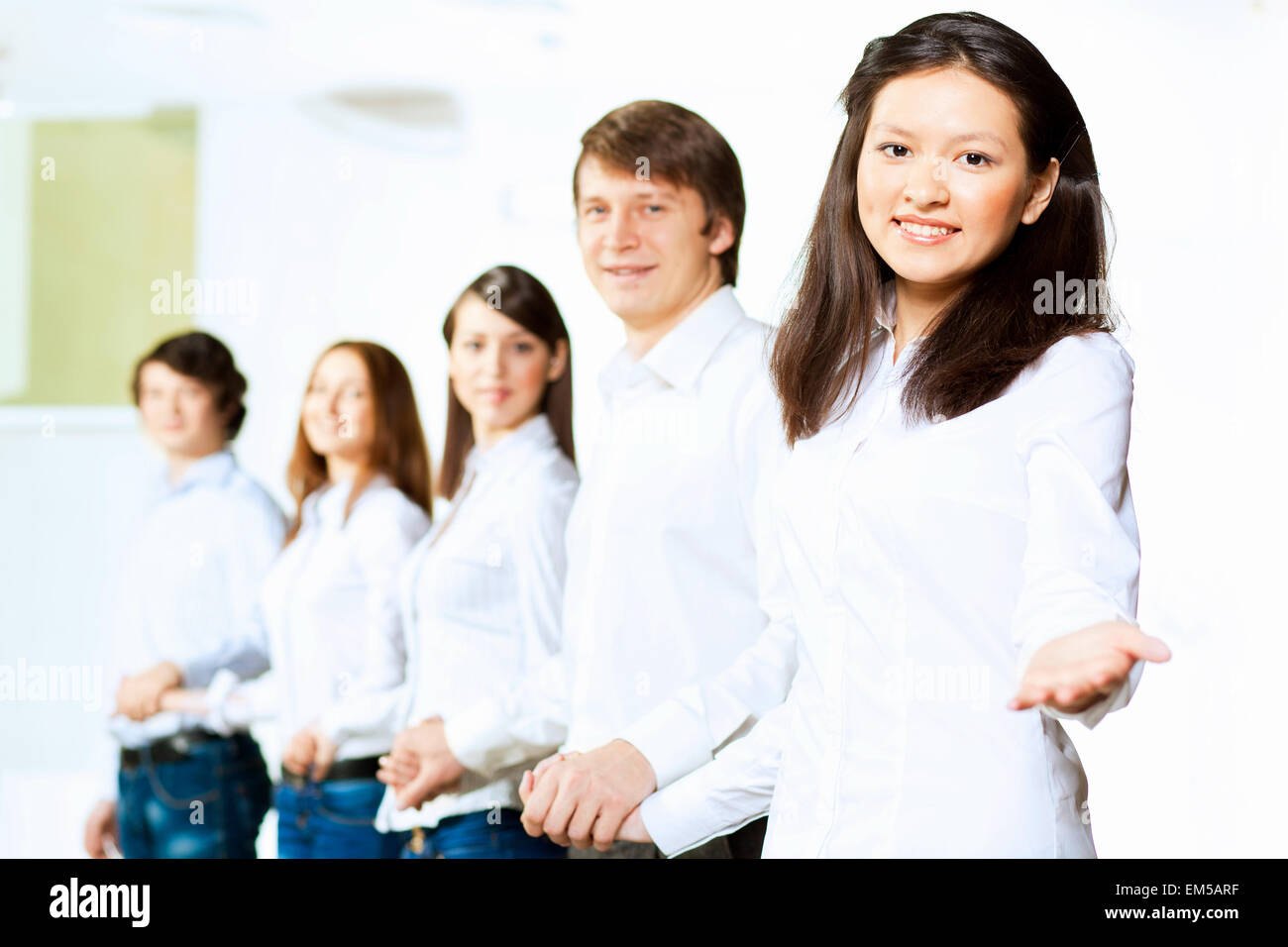 Five students smiling Stock Photo - Alamy