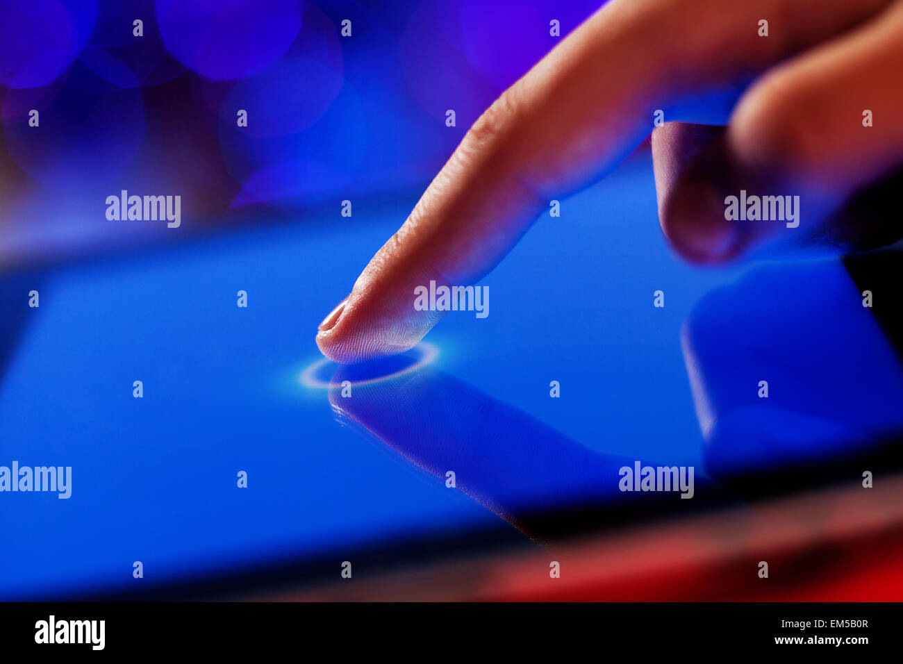 Finger touching screen Stock Photo - Alamy