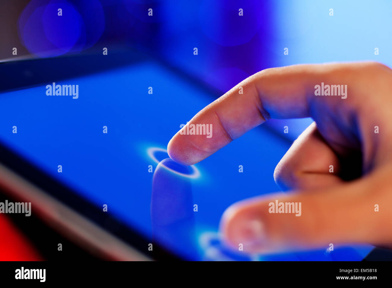 Finger touching screen Stock Photo - Alamy