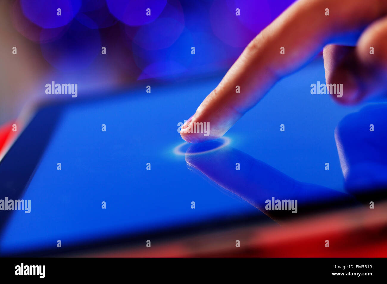 Finger touching screen Stock Photo - Alamy