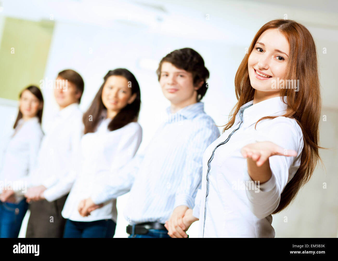 Five students smiling Stock Photo - Alamy