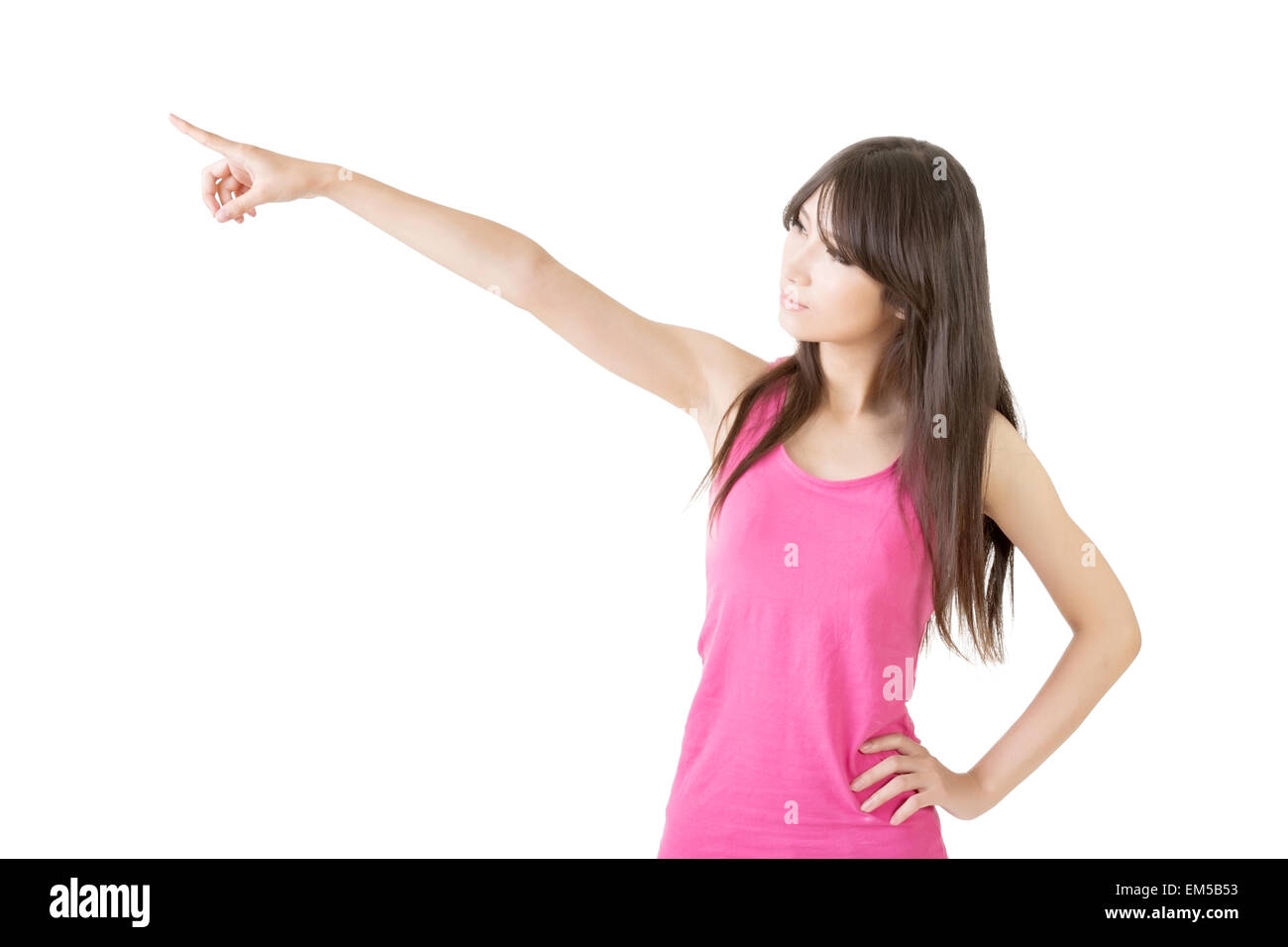 Young pretty asian woman pointing to the left Stock Photo - Alamy