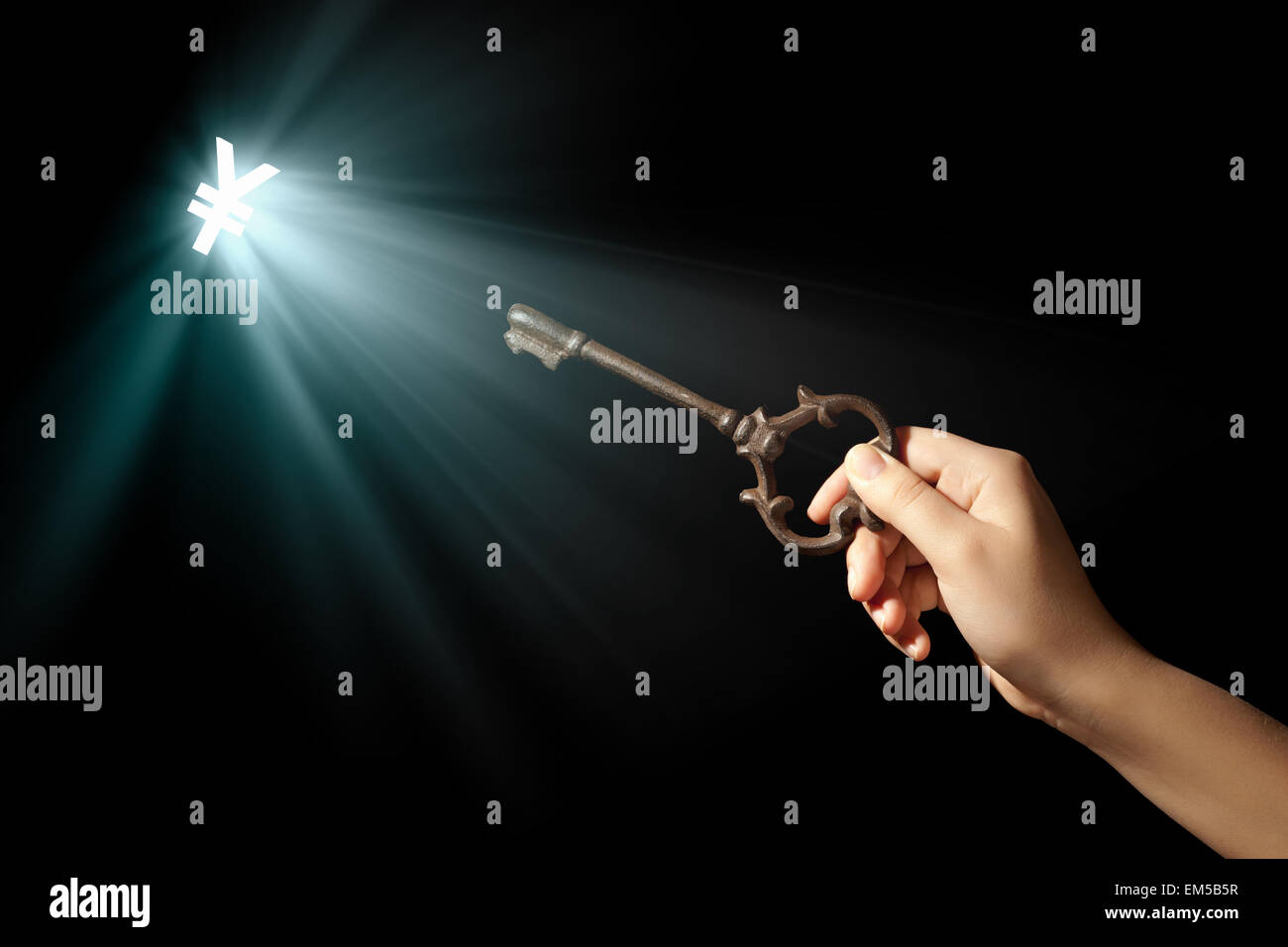 Hand with key Stock Photo - Alamy