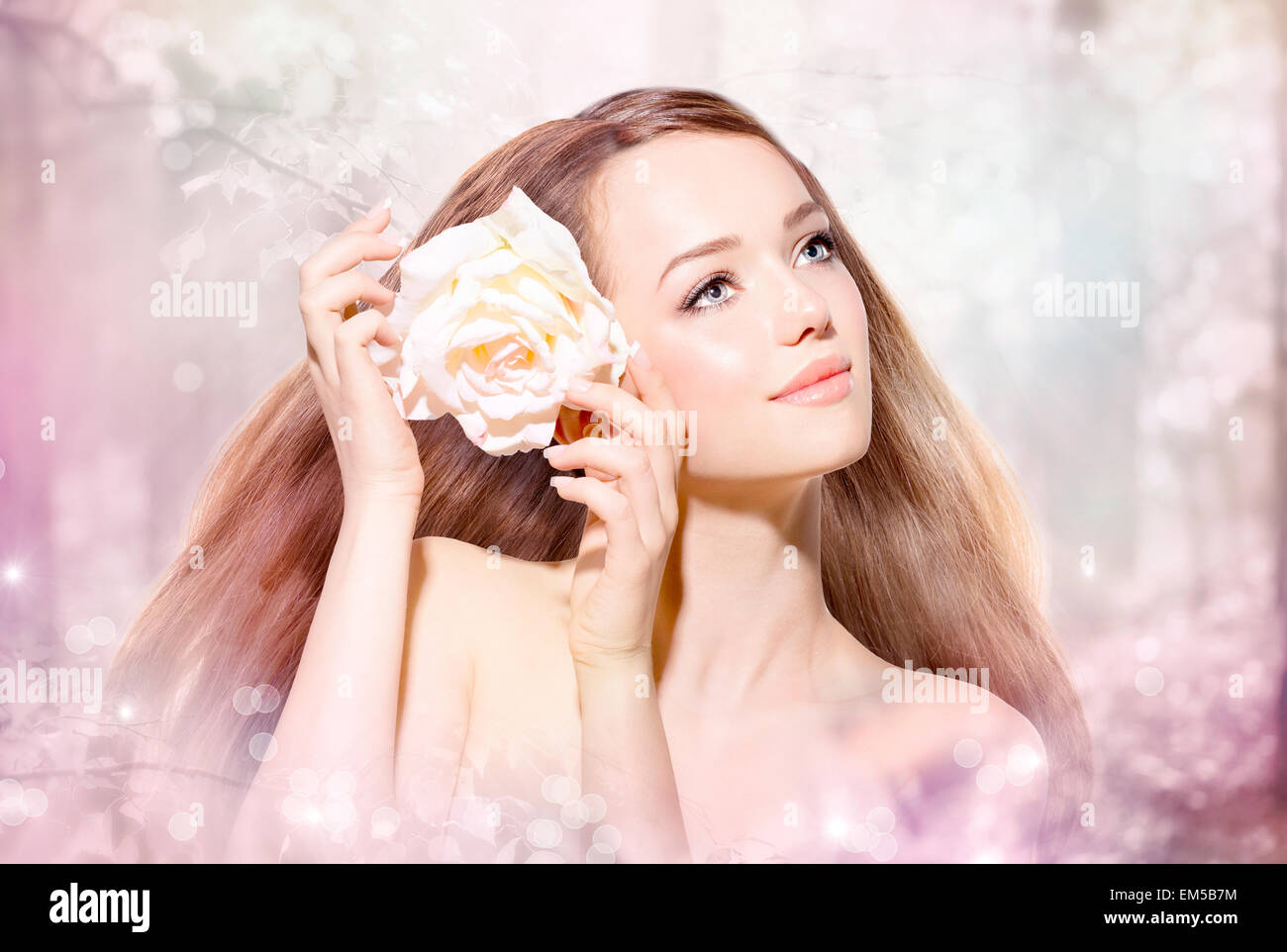 Beauty Girl Portrait. Spring Model with flower Stock Photo - Alamy