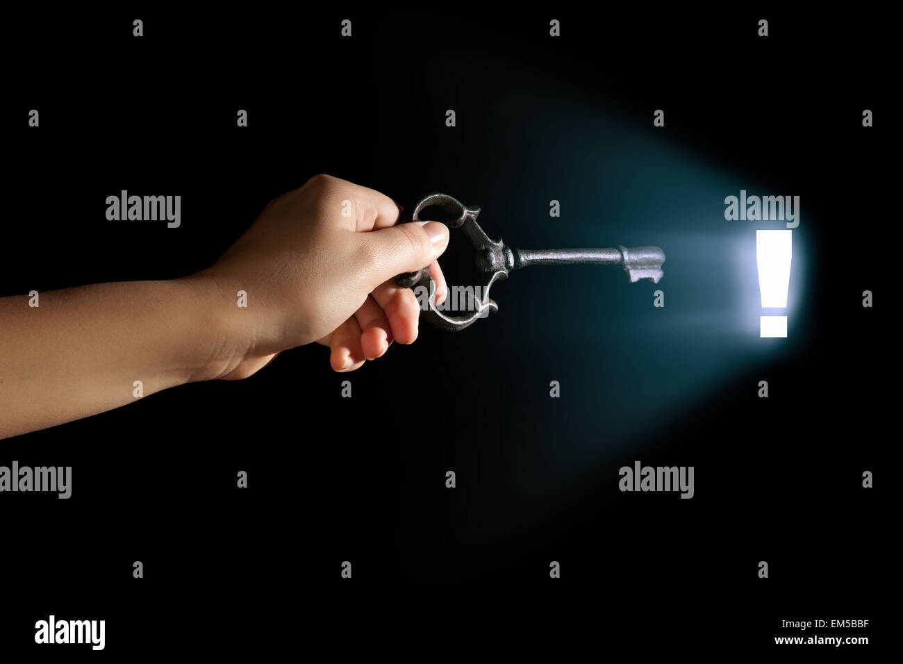 Hand with key Stock Photo - Alamy