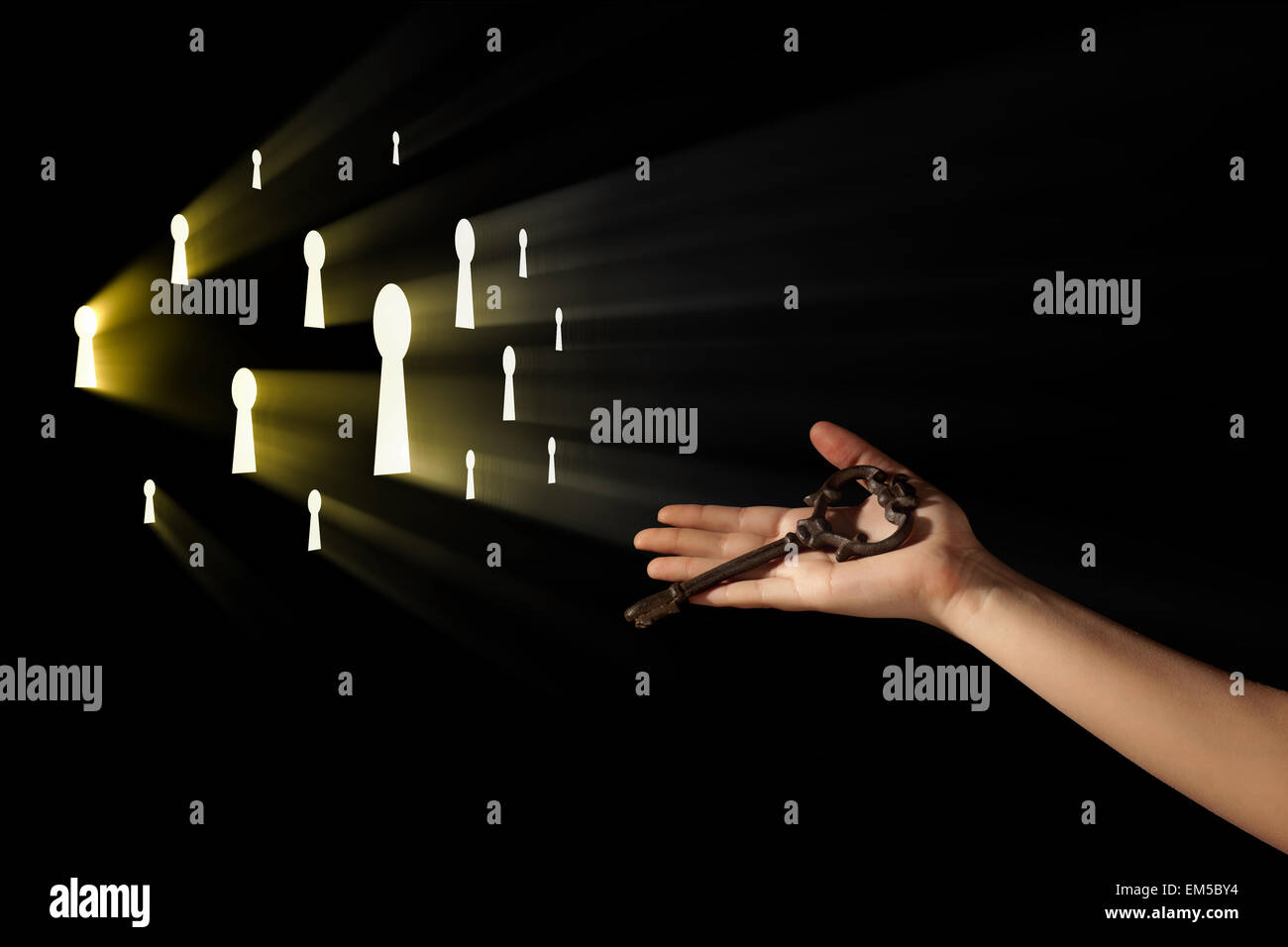 Hand with key Stock Photo - Alamy