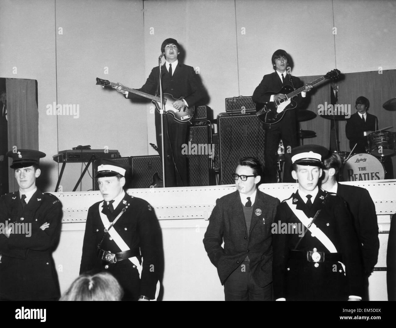 The Beatles performing on stage at De Montford Hall in Leicester, 11th ...