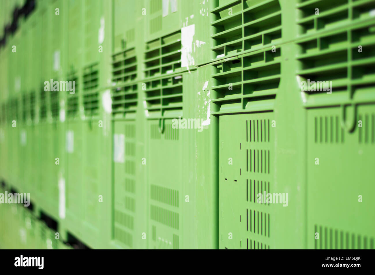Stacks upon stacks of perfectly aligned green shipping crates Stock ...