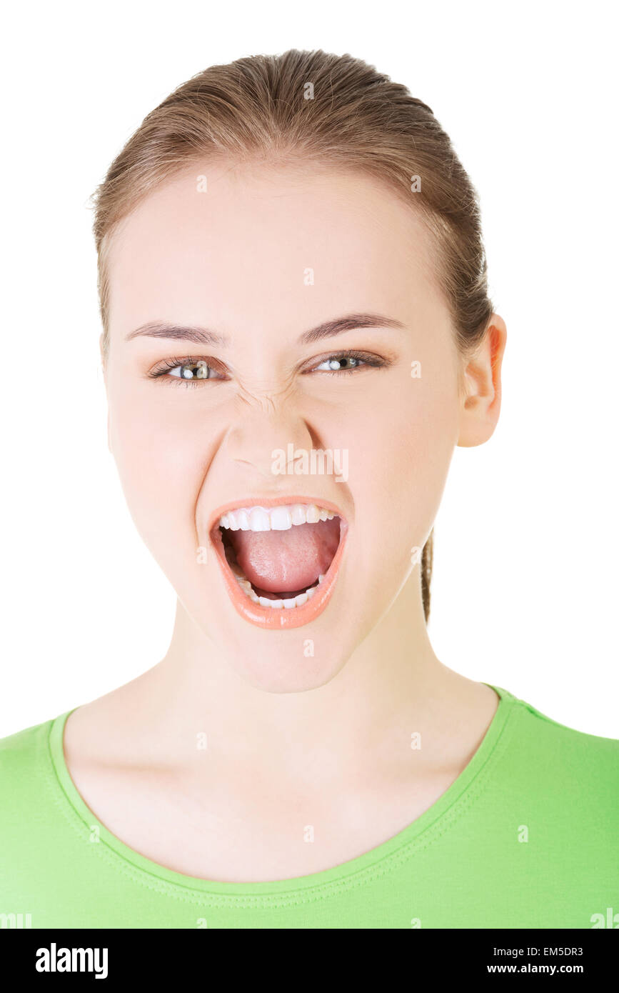 Young casual woman screaming with anger Stock Photo - Alamy