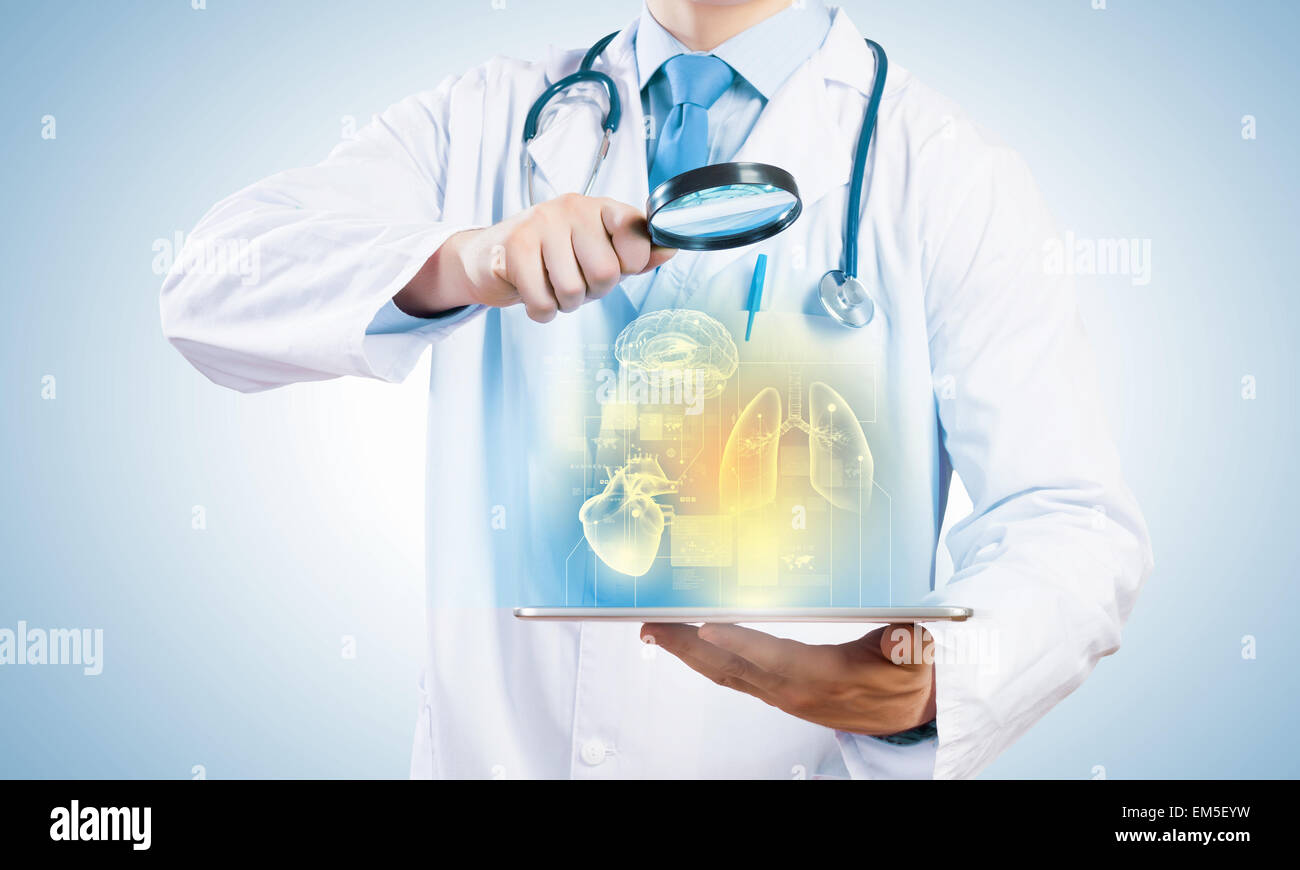 Hands doctors tablet brain hi-res stock photography and images - Alamy