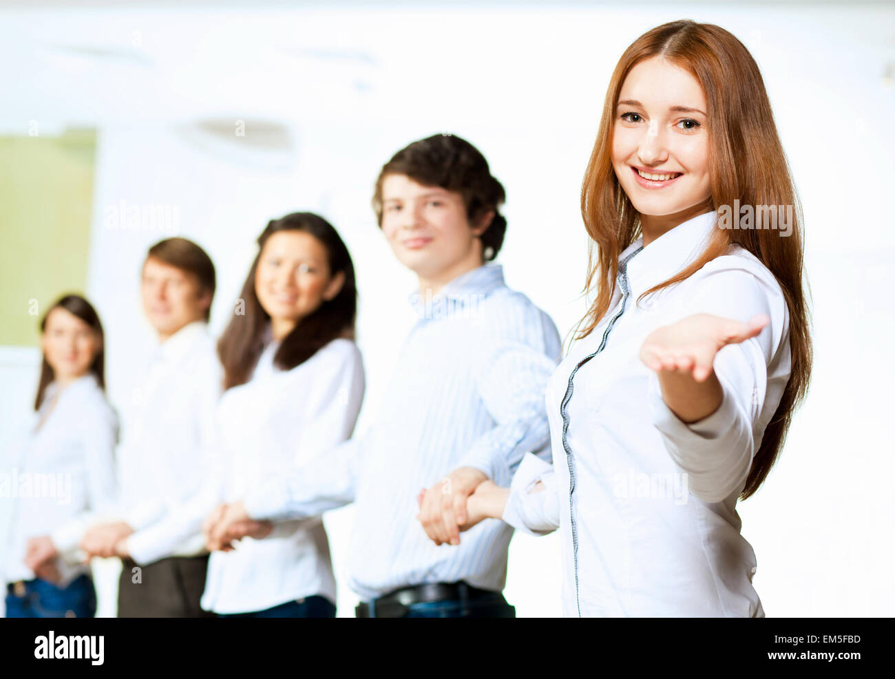 Five students smiling Stock Photo - Alamy