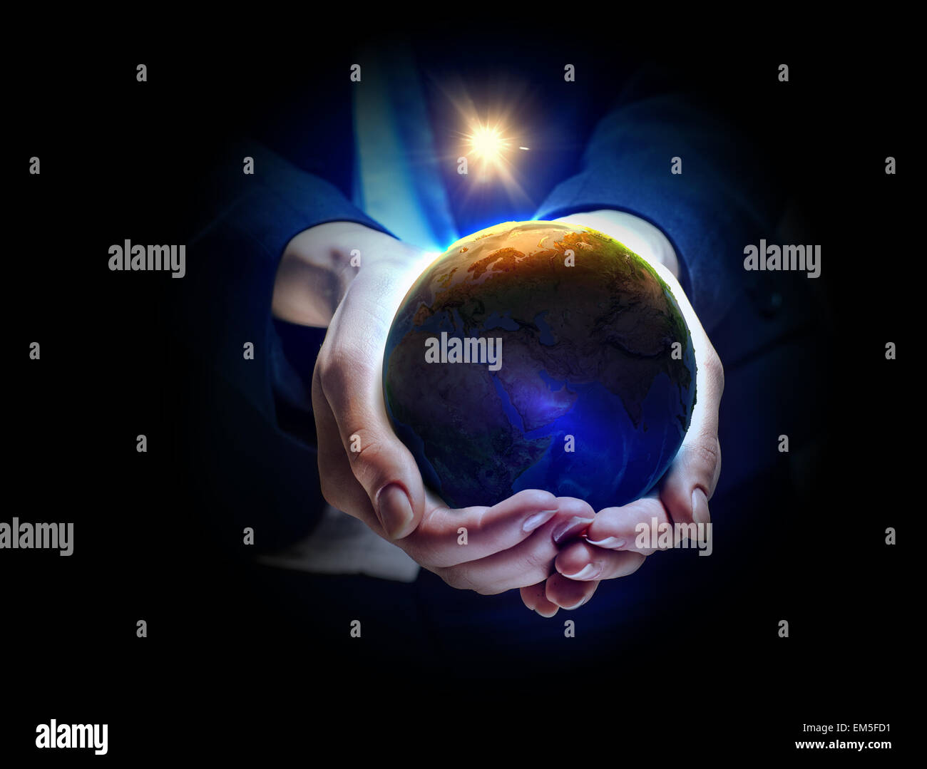 Earth planet in hands Stock Photo - Alamy