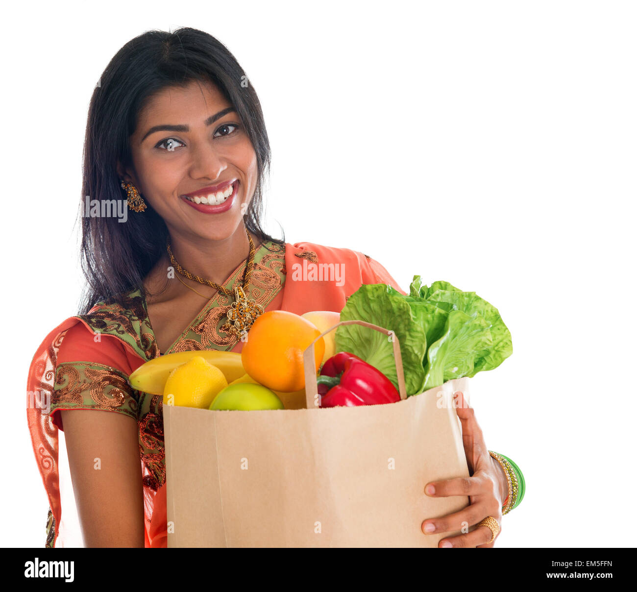 Indian woman in sari dress groceries shopping Stock Photo - Alamy