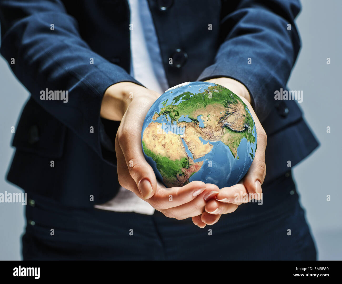Earth planet in hands Stock Photo - Alamy