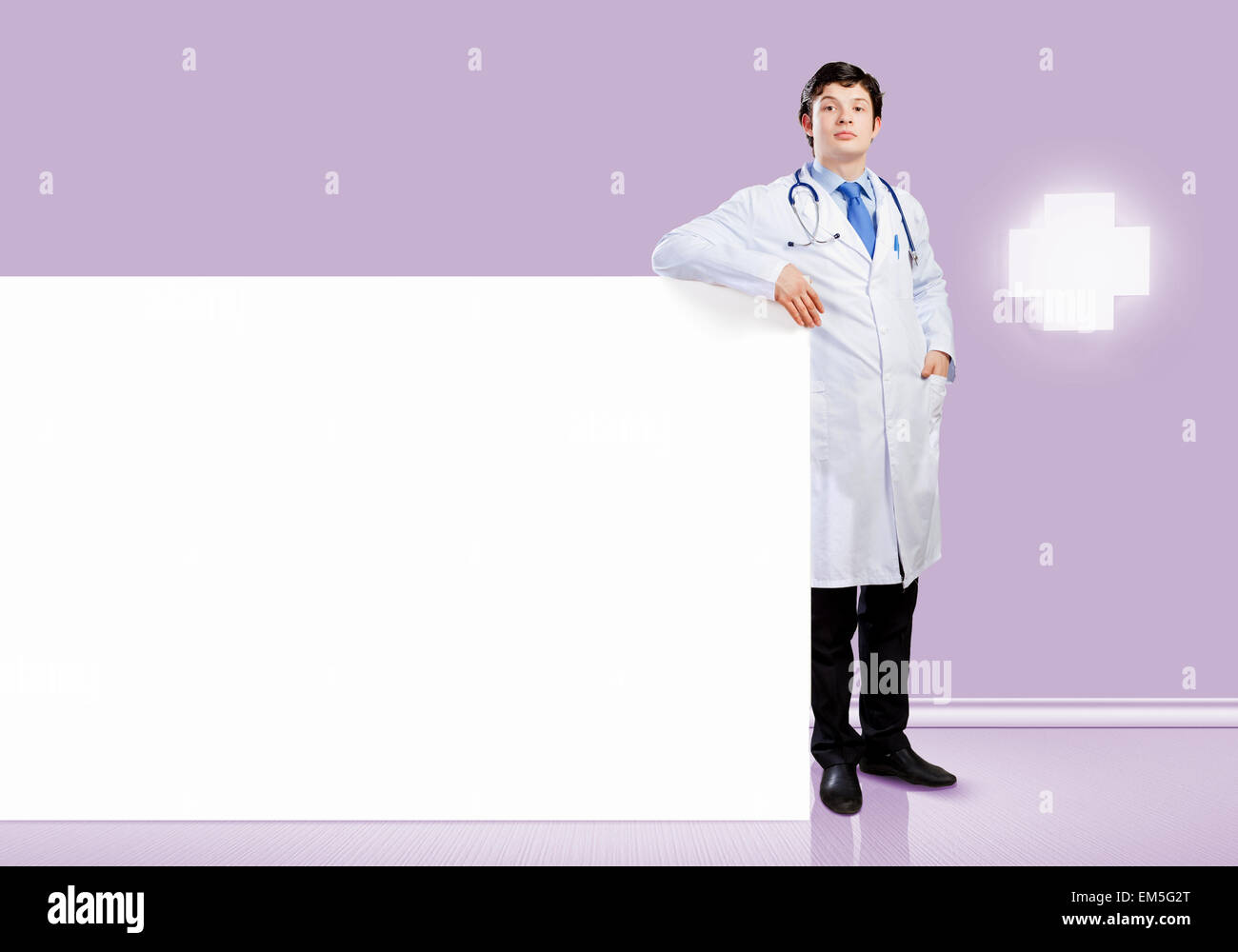 Male doctor with banner Stock Photo - Alamy