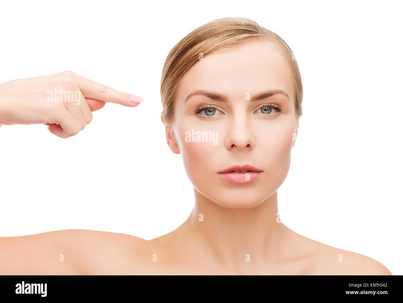 woman pointing at her face Stock Photo - Alamy