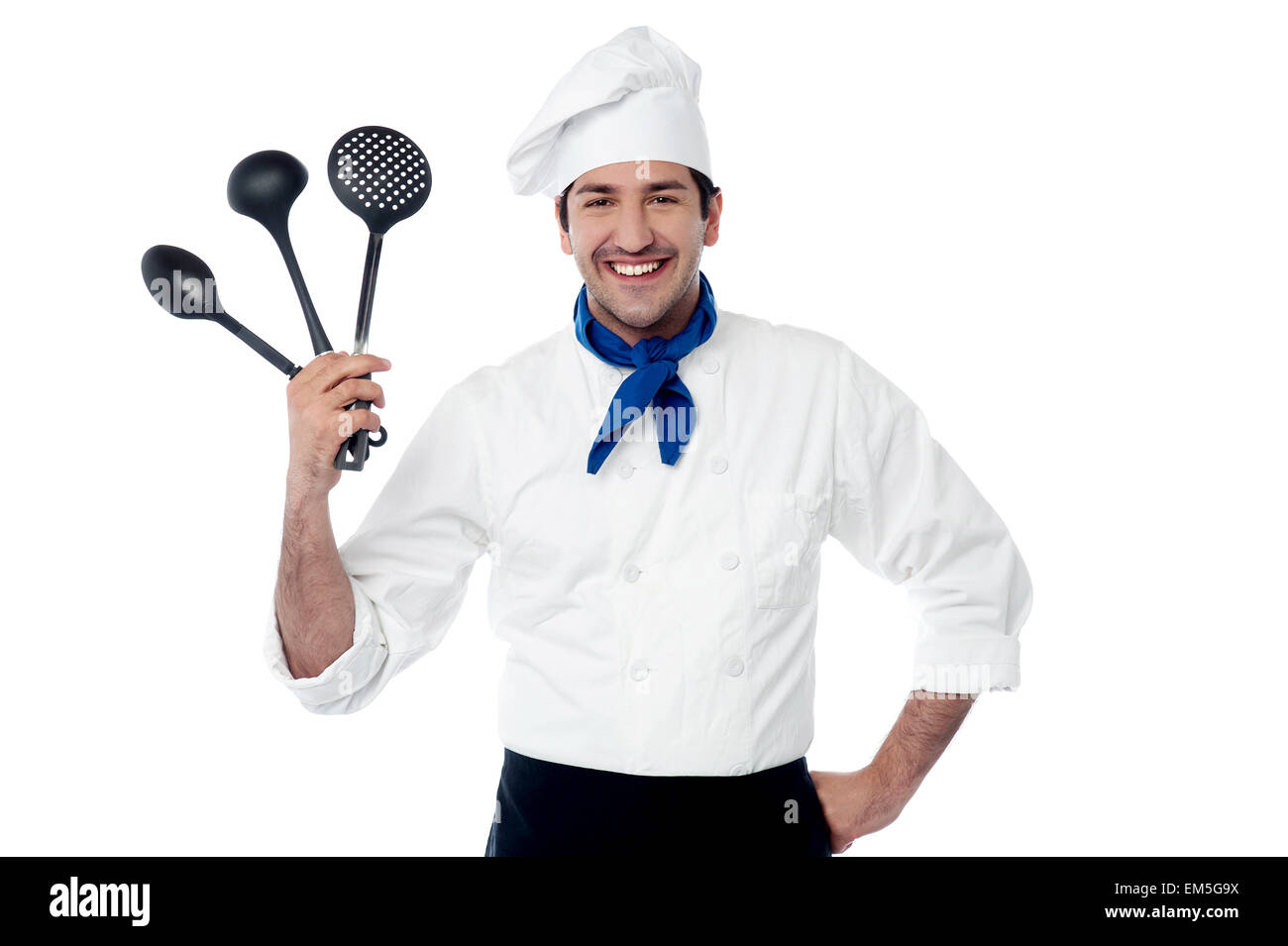 Chef showing kitchen essentials Stock Photo - Alamy