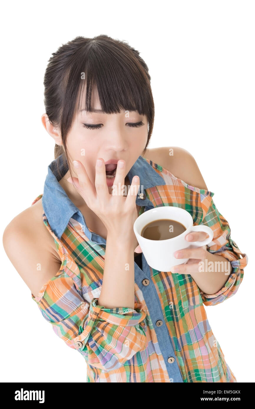 Tired asian woman with cup of coffee Stock Photo - Alamy