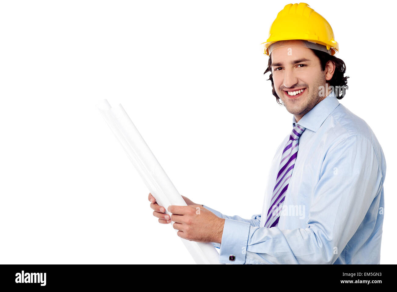 Male architect with construction plan Stock Photo - Alamy