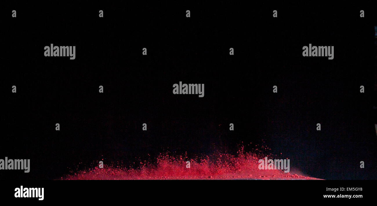 red powder paint explosion Stock Photo - Alamy
