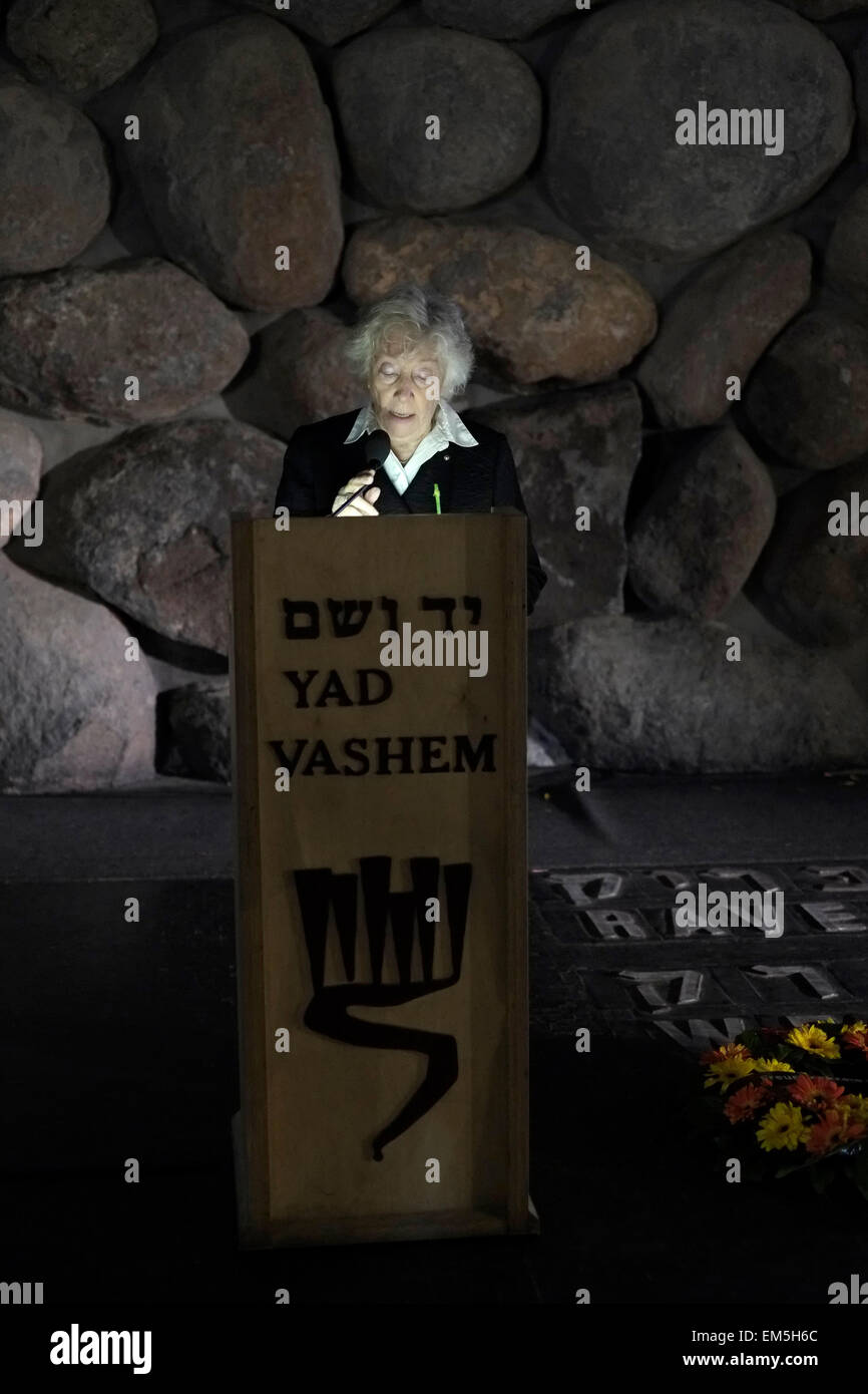 An elderly Jewish woman reads names of her relatives who were killed in ...
