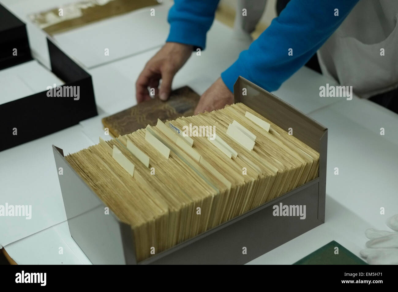 A Yad Vashem researcher working at the Research Room of the Library of ...