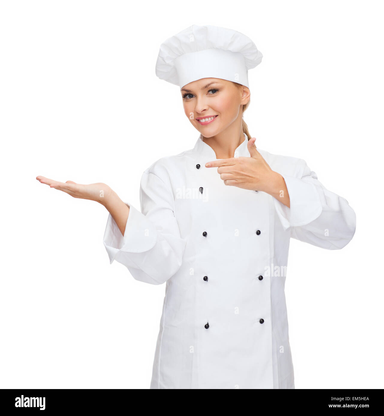 smiling female chef holding something on hand Stock Photo - Alamy