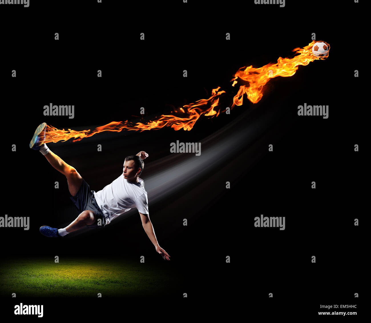 Football player with ball Stock Photo - Alamy