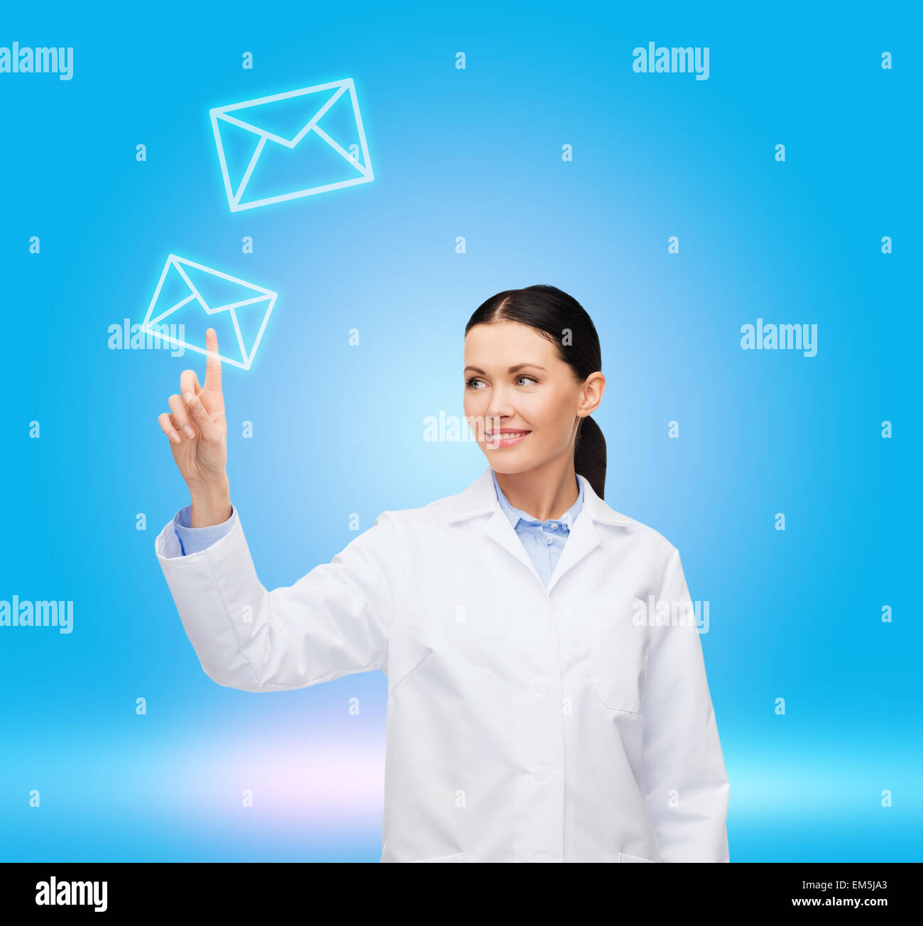 smiling female doctor pointing to envelope Stock Photo - Alamy