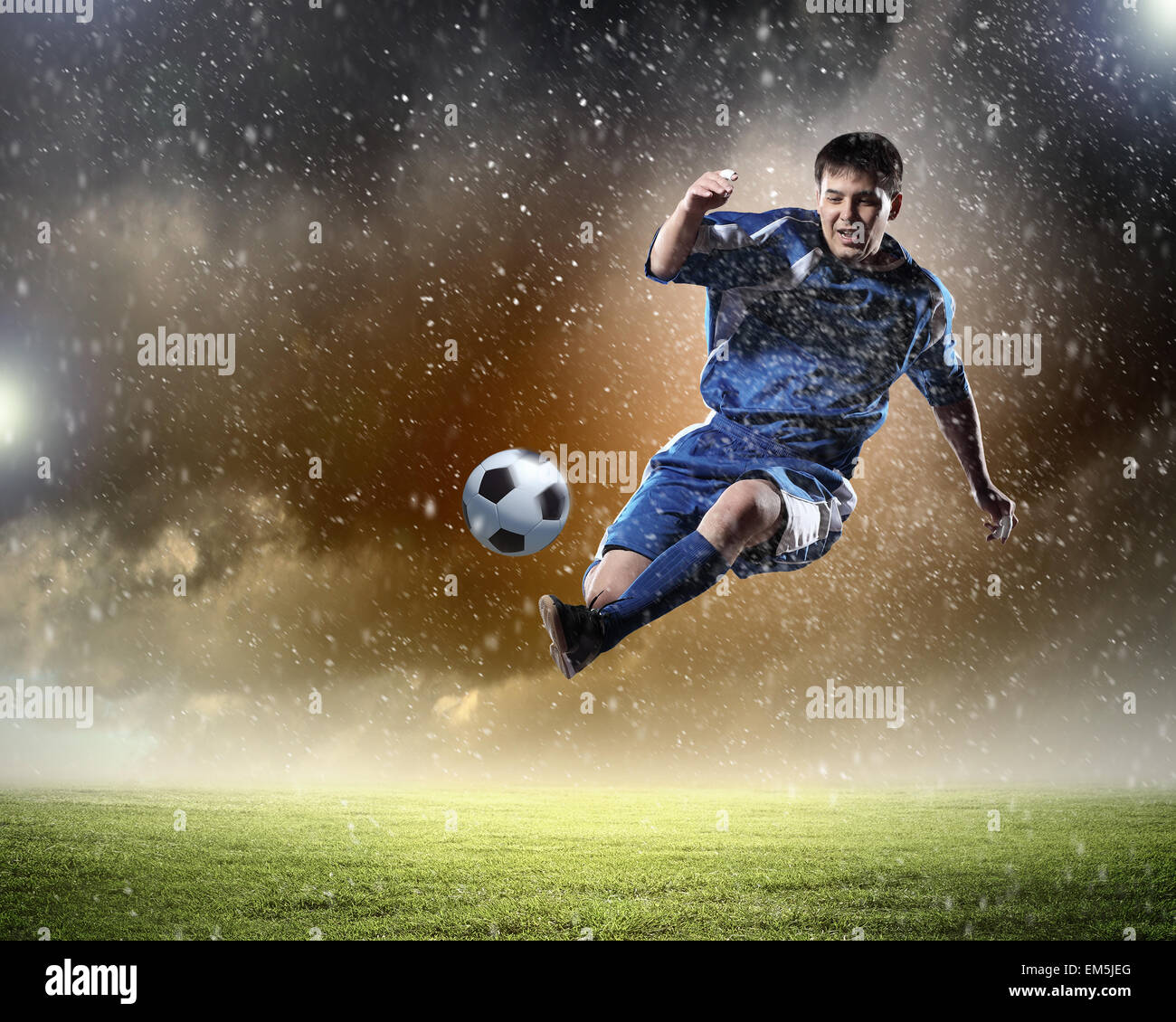 Football player stadium hitting ball hi-res stock photography and ...